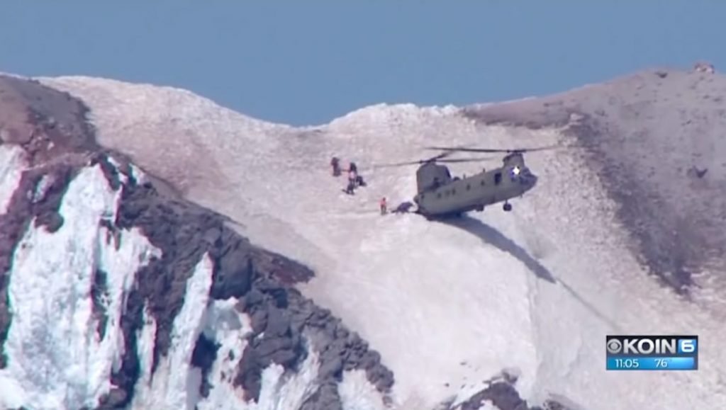 Watch Pilot's Spectacular Rescue as he Lands Rear of Helicopter on ...